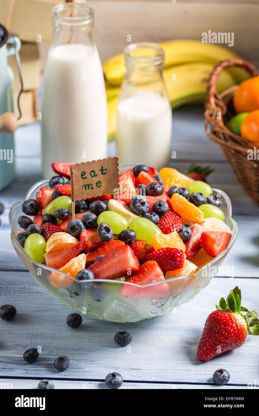 Enjoy your fresh fruit salad Stock Photo - Alamy