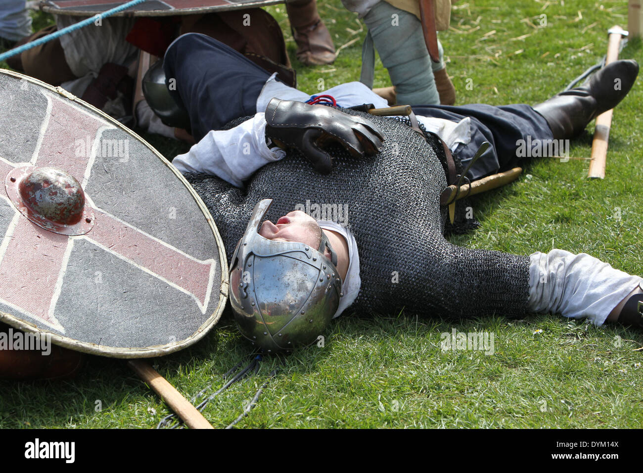 A costumed Viking warrior lies prone during the battle re-enactment at ...