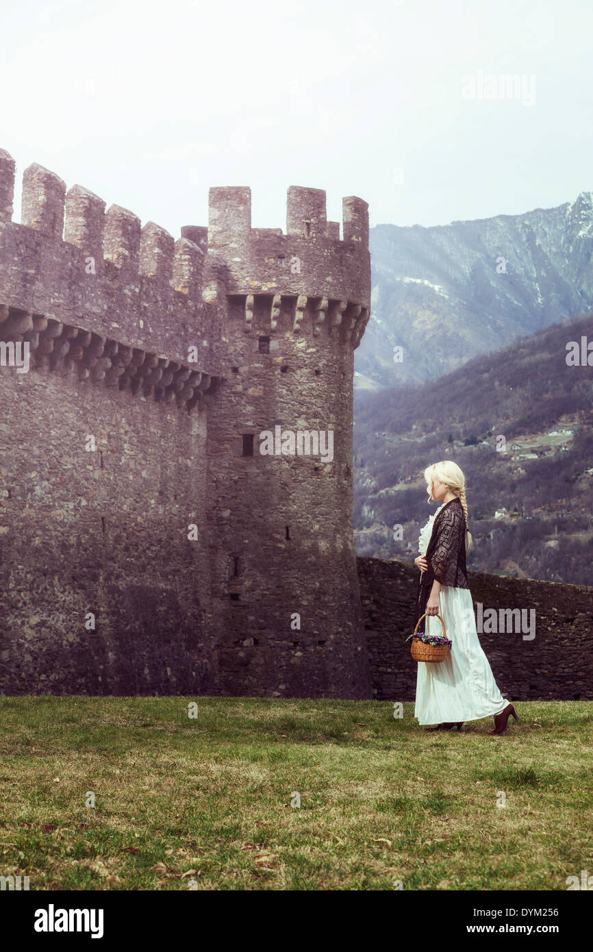 Girl in dress walking along hi-res stock photography and images - Alamy