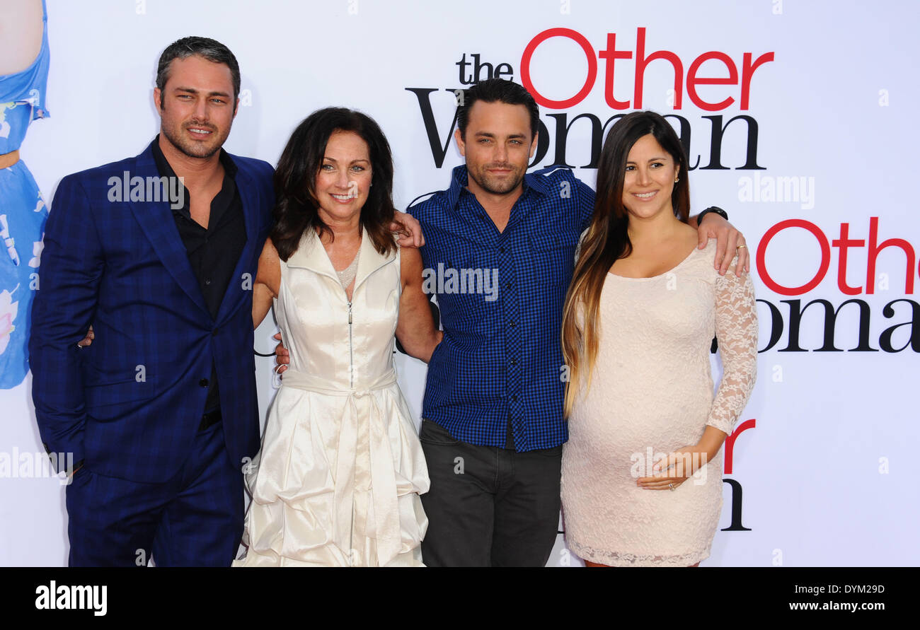 Taylor kinney with his mother and brother High Resolution Stock ...