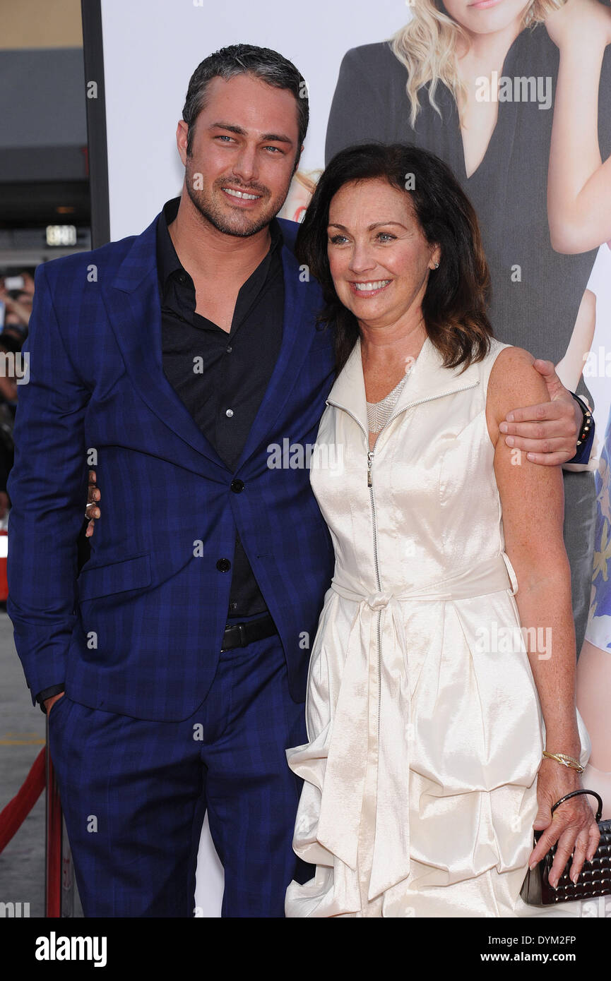 Hollywood, California, USA. 21st Apr, 2014. Taylor Kinney & Pam Kinney ...