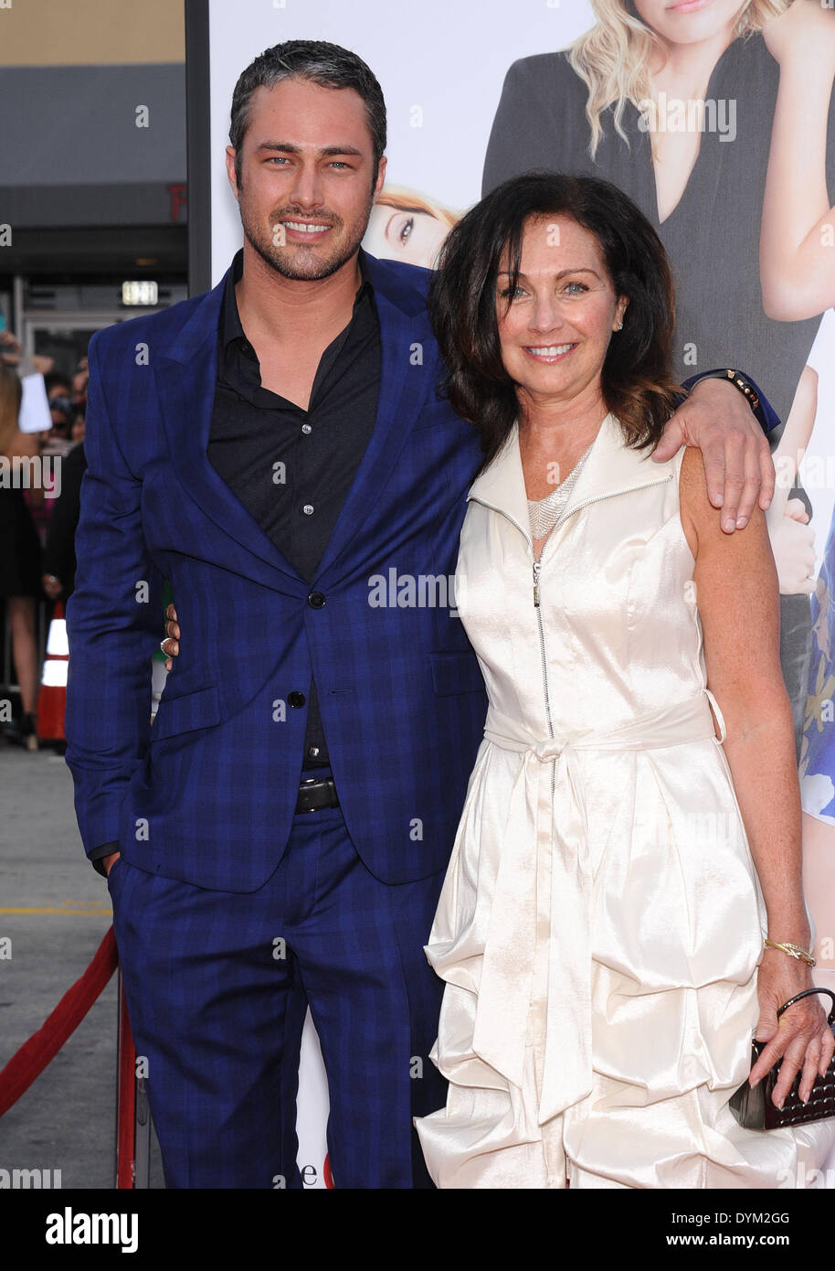 Hollywood, California, USA. 21st Apr, 2014. Taylor Kinney & Pam Kinney ...