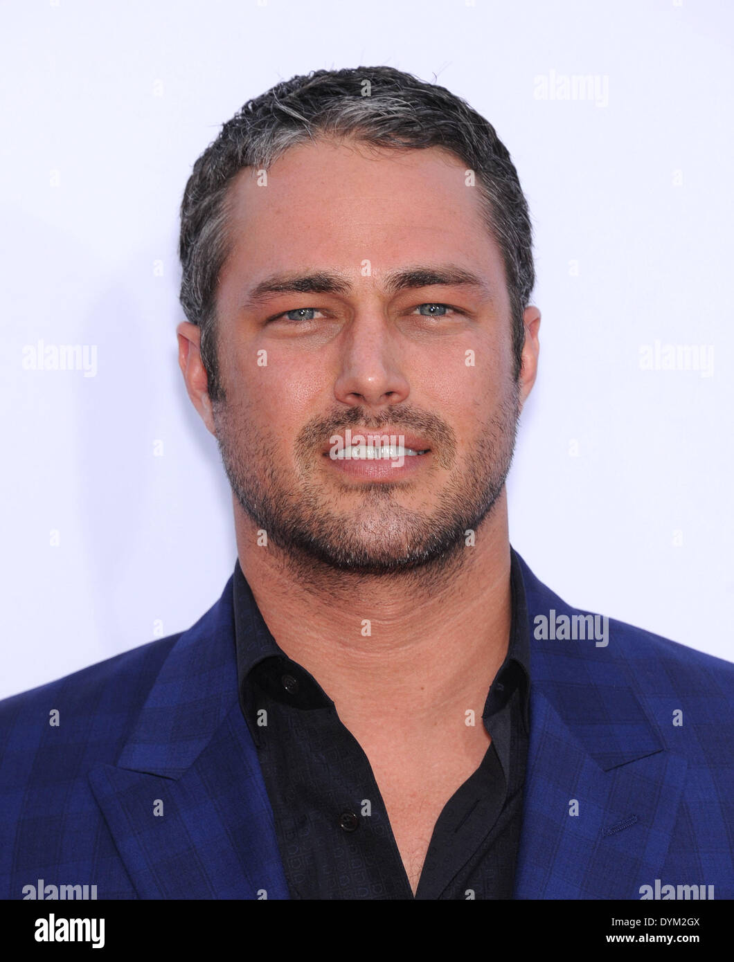 Hollywood, California, USA. 21st Apr, 2014. Taylor Kinney arrives for ...