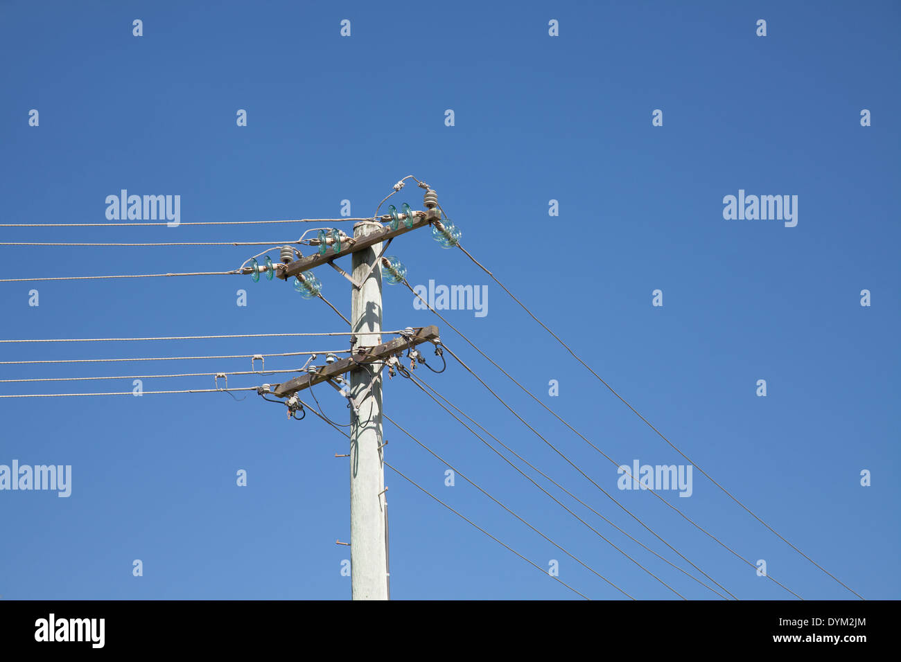 Old wooden electricity pylons in Country Australia Stock Photo - Alamy