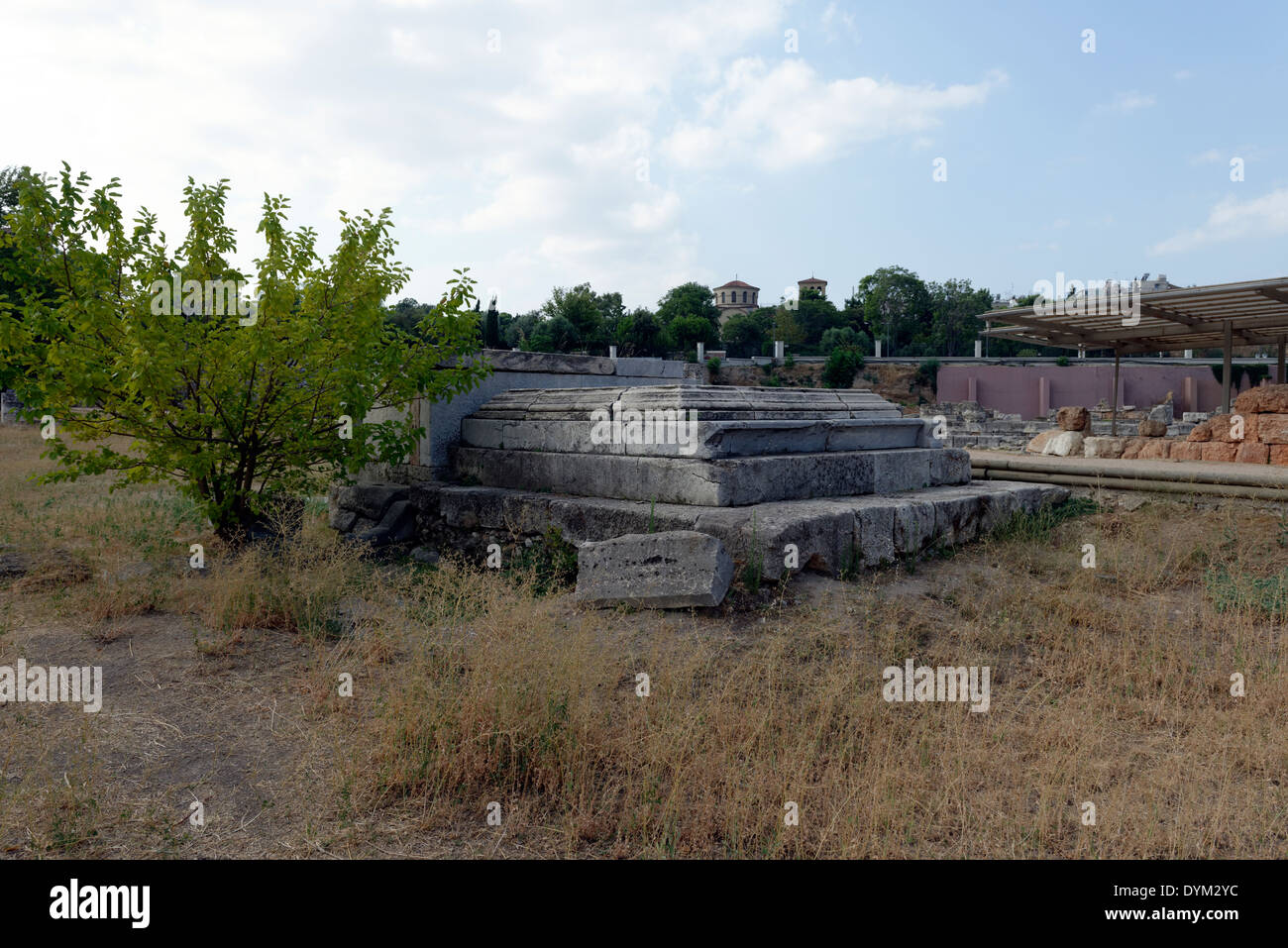 Roman statue base erected in front of a Hellenistic period outer ...