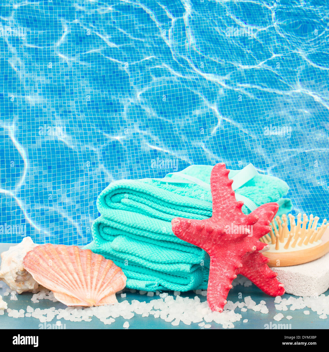 Sea spa setting by pool side Stock Photo - Alamy