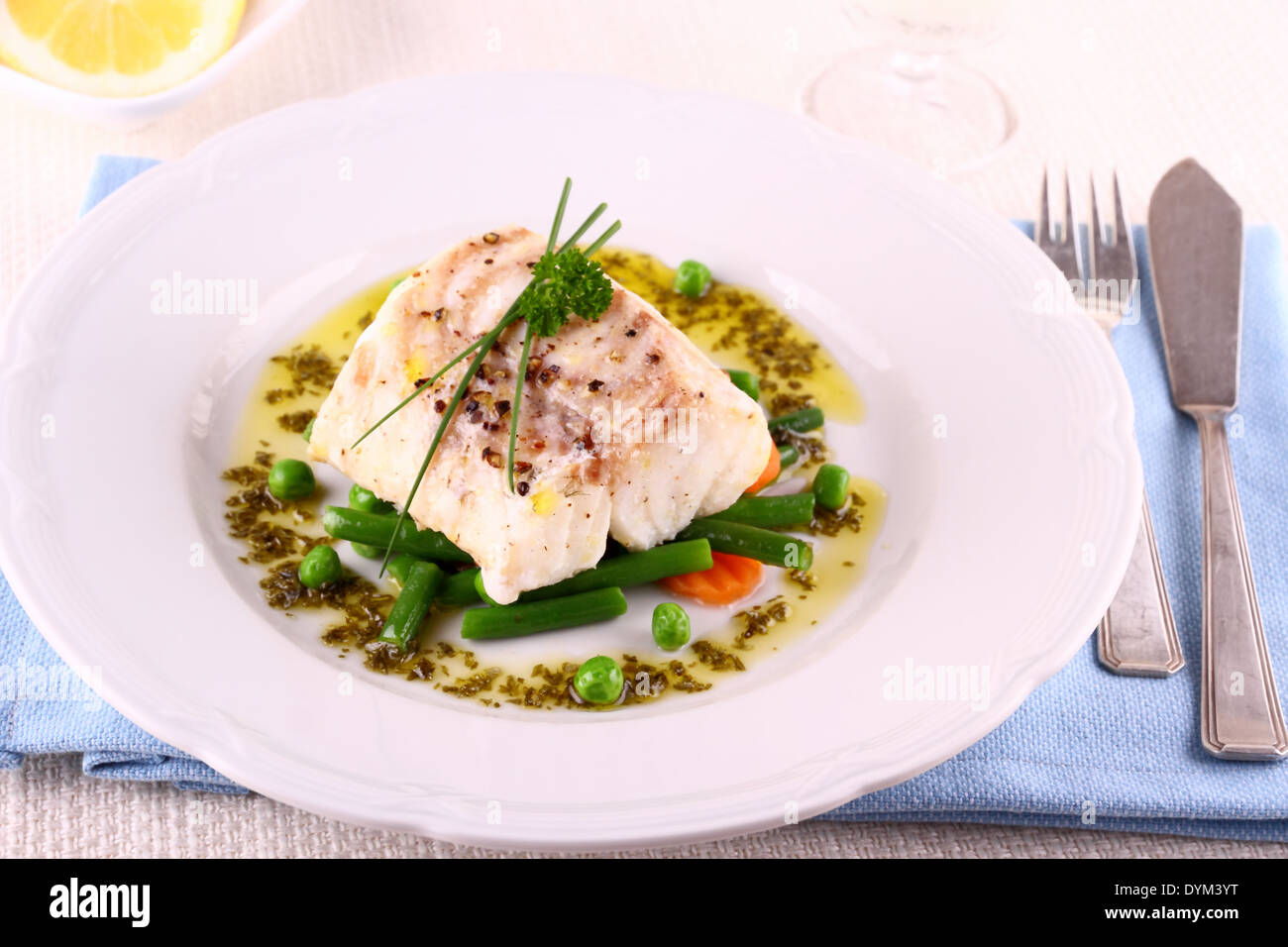 Cod Fillet with green beans, peas, parsley, olive oil and wine Stock ...