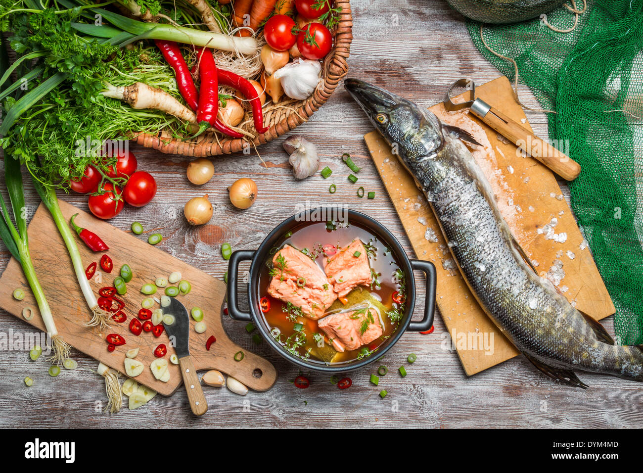 Pike and fresh vegetables for soup of fish Stock Photo - Alamy