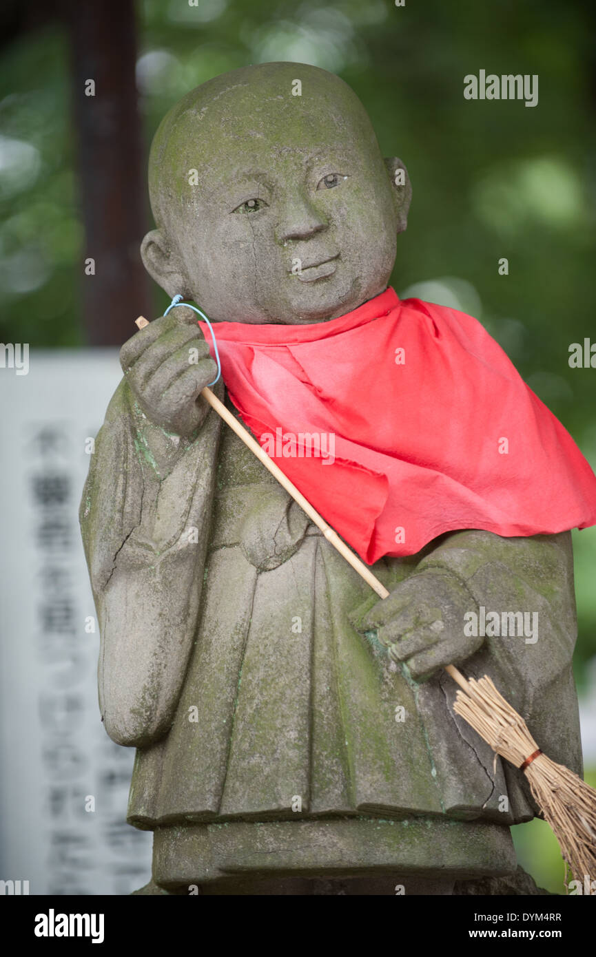 Stone statue in a temple, Tokyo, Japan Stock Photo - Alamy