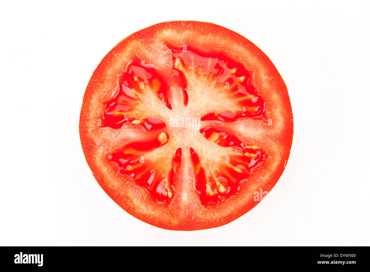 Tomato piece section isolated on white background Stock Photo - Alamy