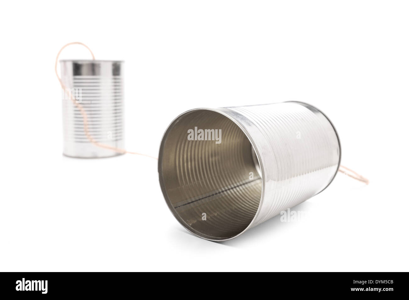 Tin can phone connected by a red string Stock Photo - Alamy