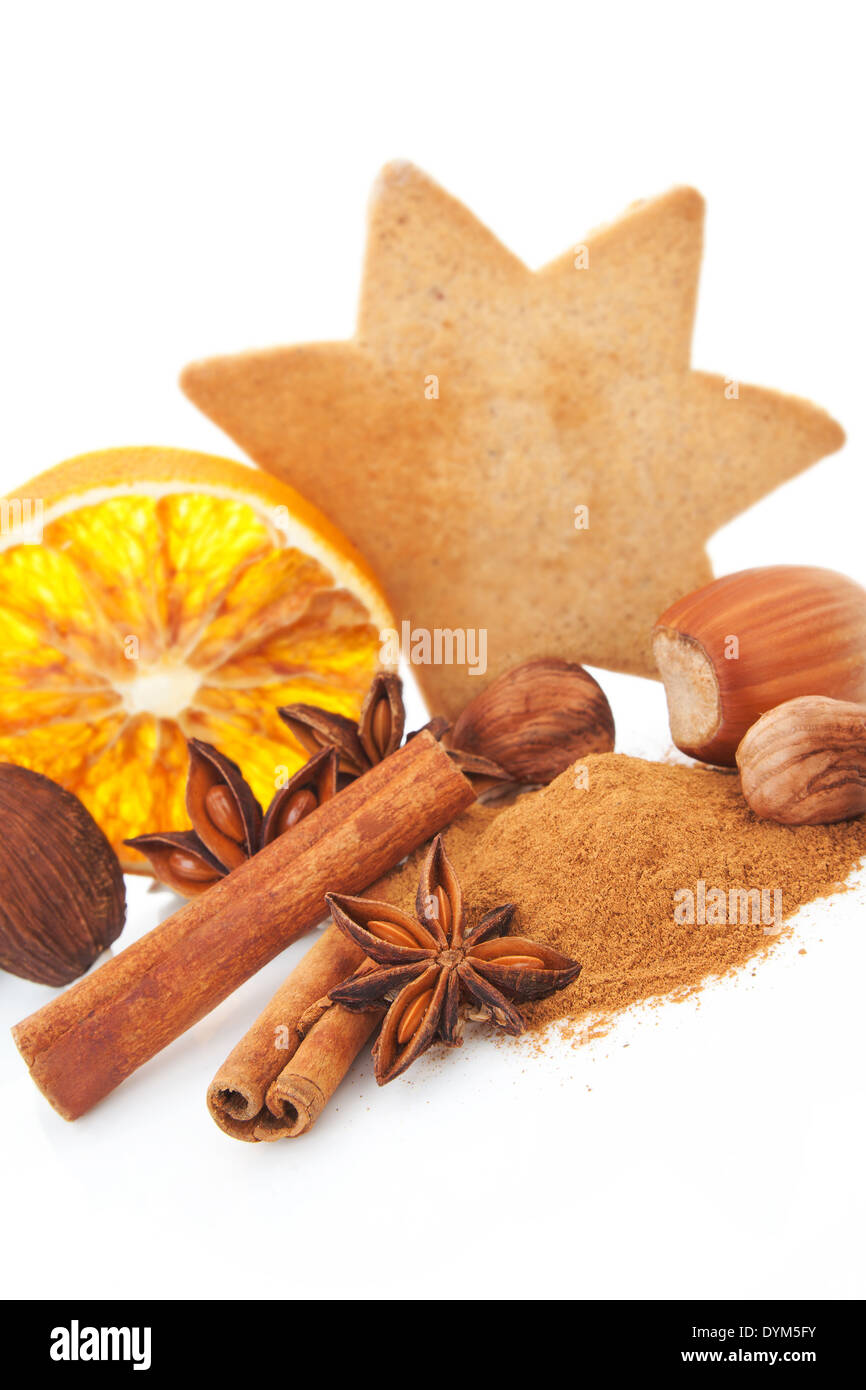 Natural christmas still life with cinnamon, various nuts, gingerbread ...