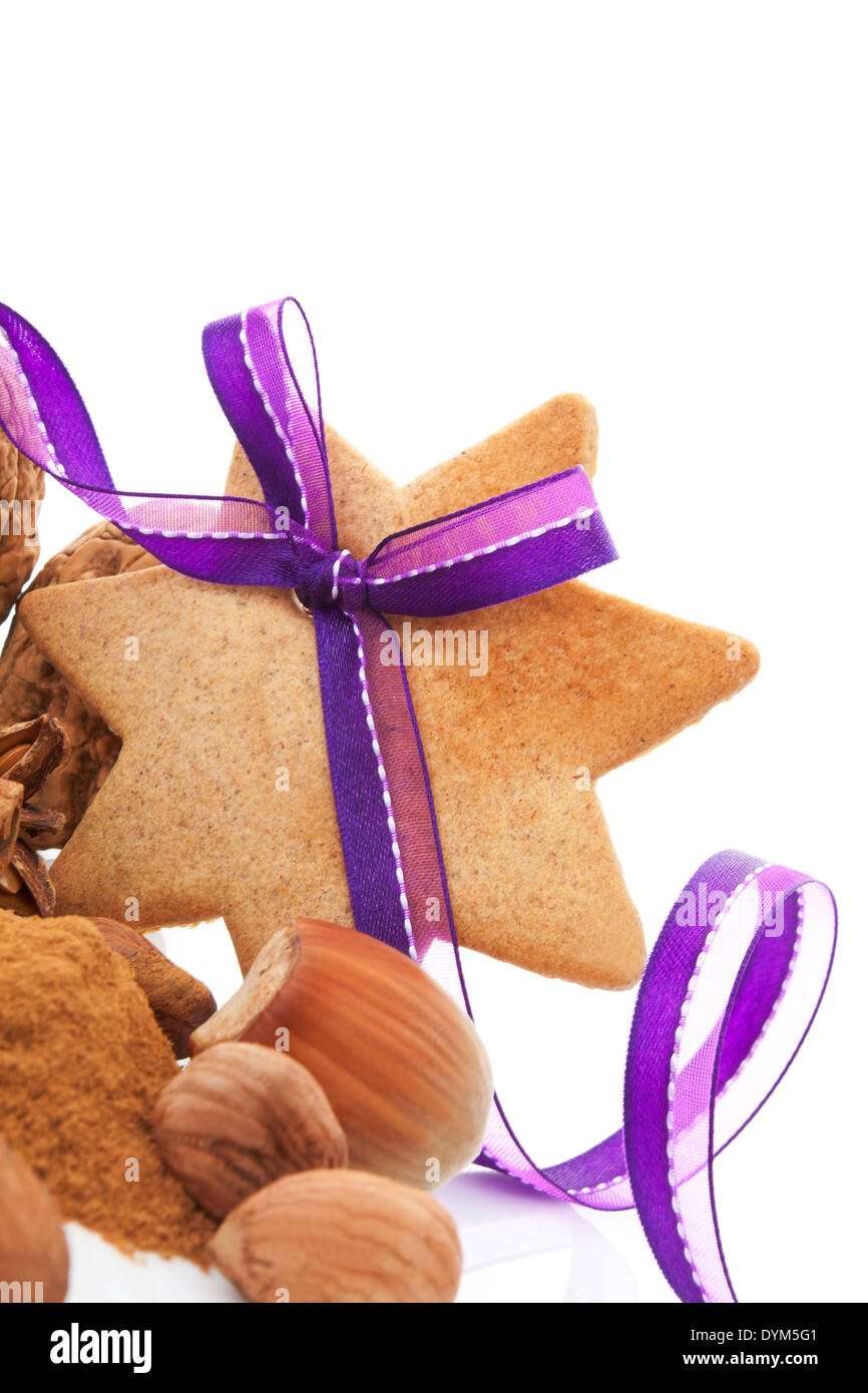 Gingerbread star cookie with hazelnut, cinnamon and purple ribbon ...