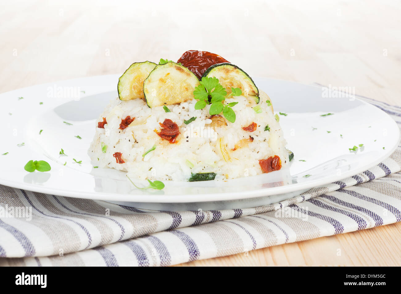 Delicious risotto, traditional italian rice dish with dried tomatoes ...