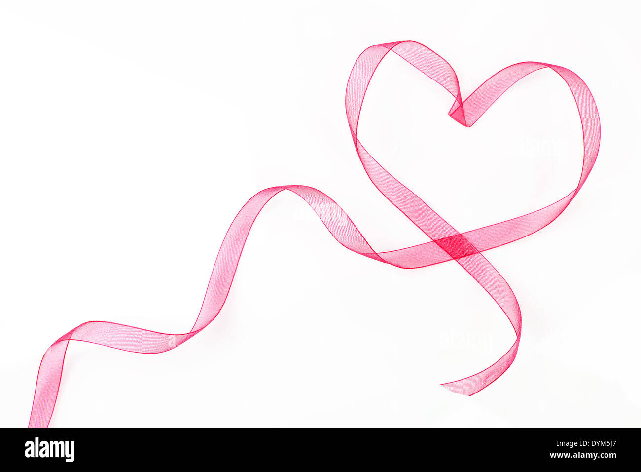 Pink ribbon heart isolated on white background with copy space ...
