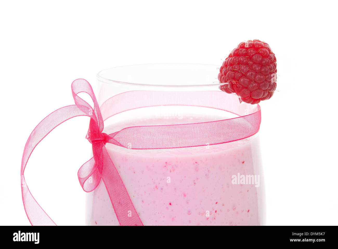 Luxurious raspberry milkshake detail decorated with pink ribbon and ...