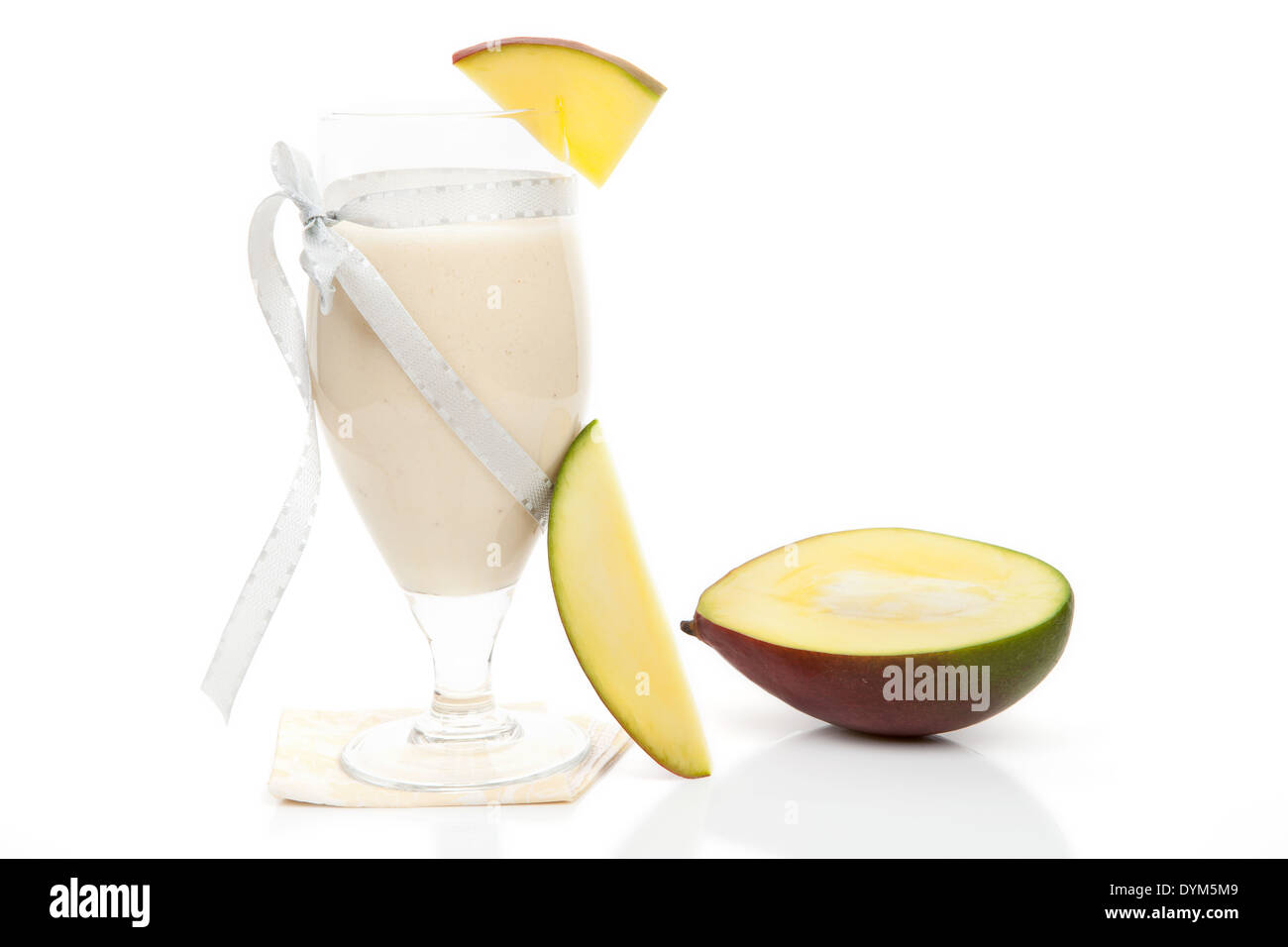 Fresh tropical mango fruit shake with ripe mango fruit isolated on ...