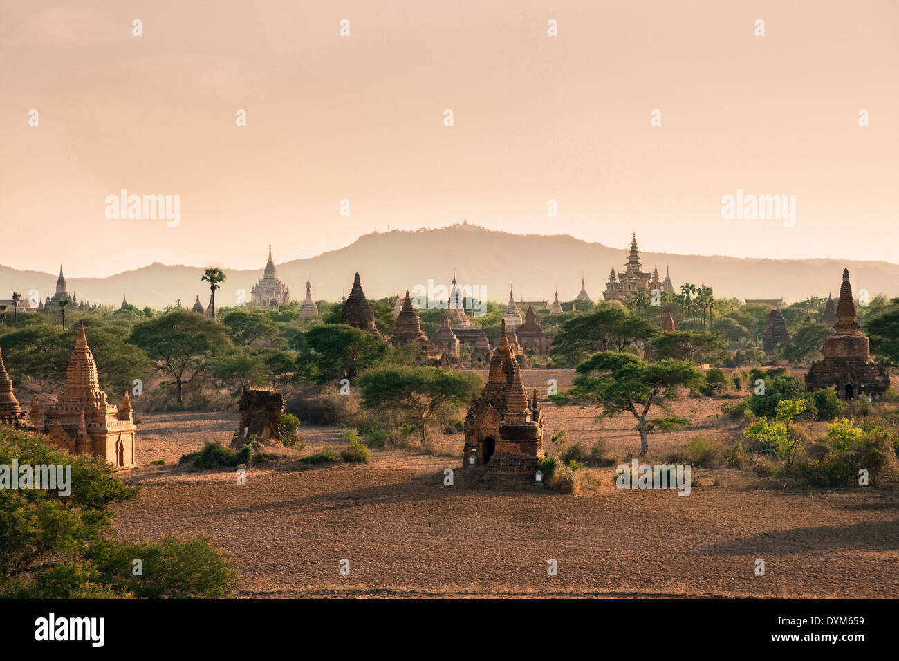 Famous ancient buddhist temples in Bagan, Burma covered in mystic light ...