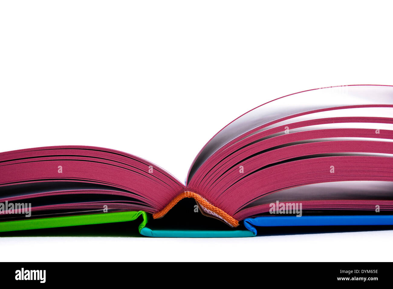 Open colorful design book on white background. Contemporary knowledge ...