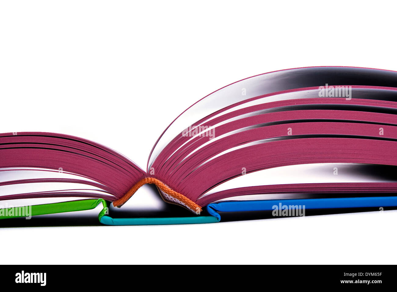 open colorful design book on white background Stock Photo - Alamy