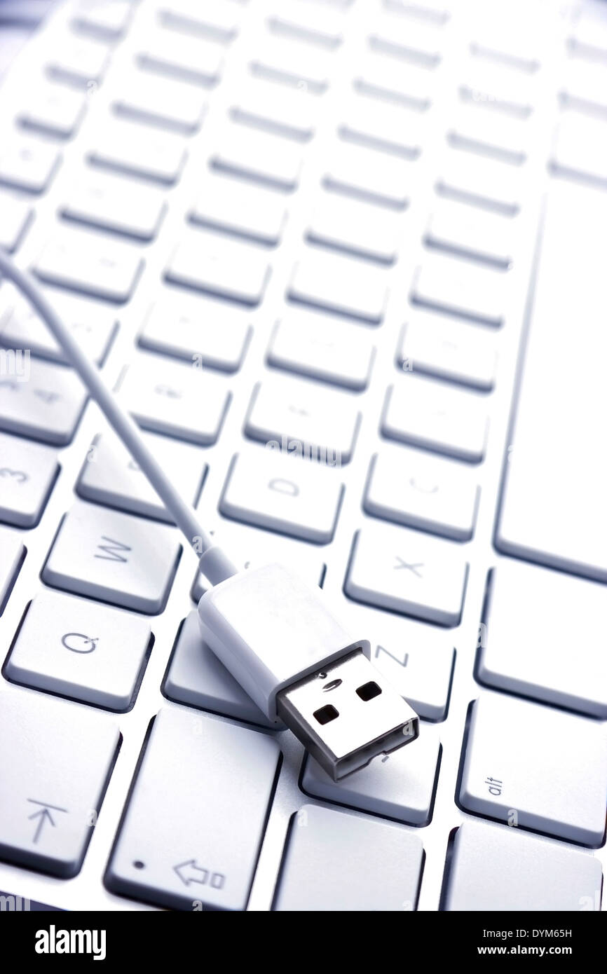 apple keyboard with usb jack on white background Stock Photo - Alamy