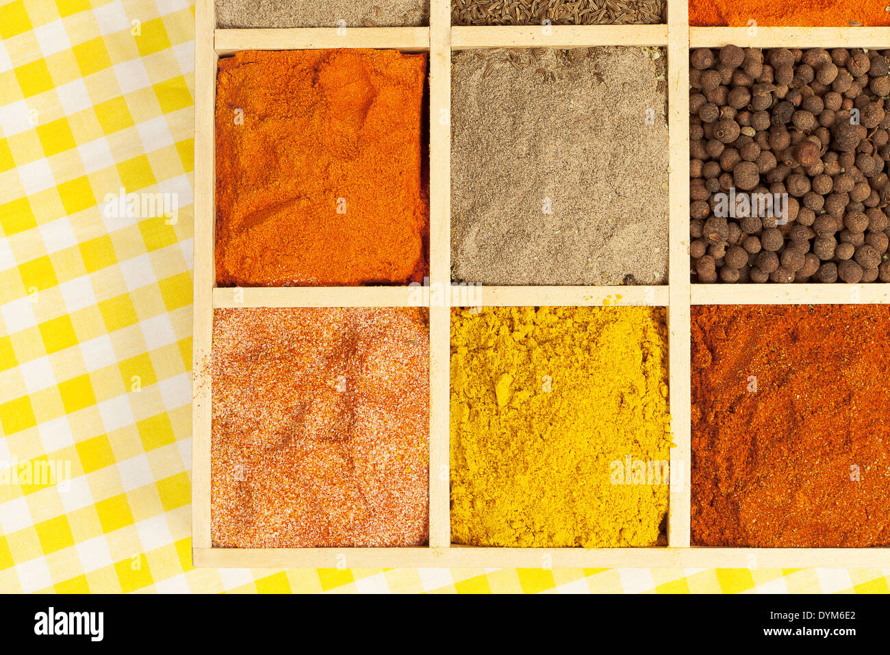 Various spices in wooden shelf, top view. Culinary cooking concept ...