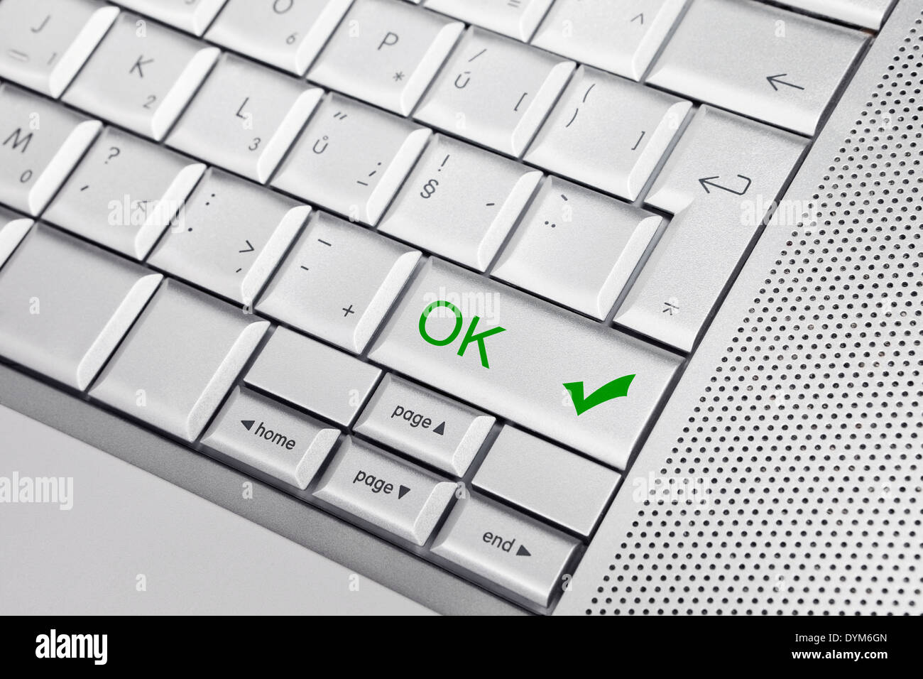 Silver keyboard with OK icon and text Ok on a key. Business concept ...