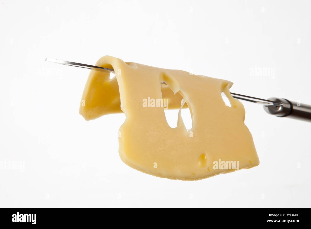 Emmental cheese slice on cheese knife isolated on white background ...