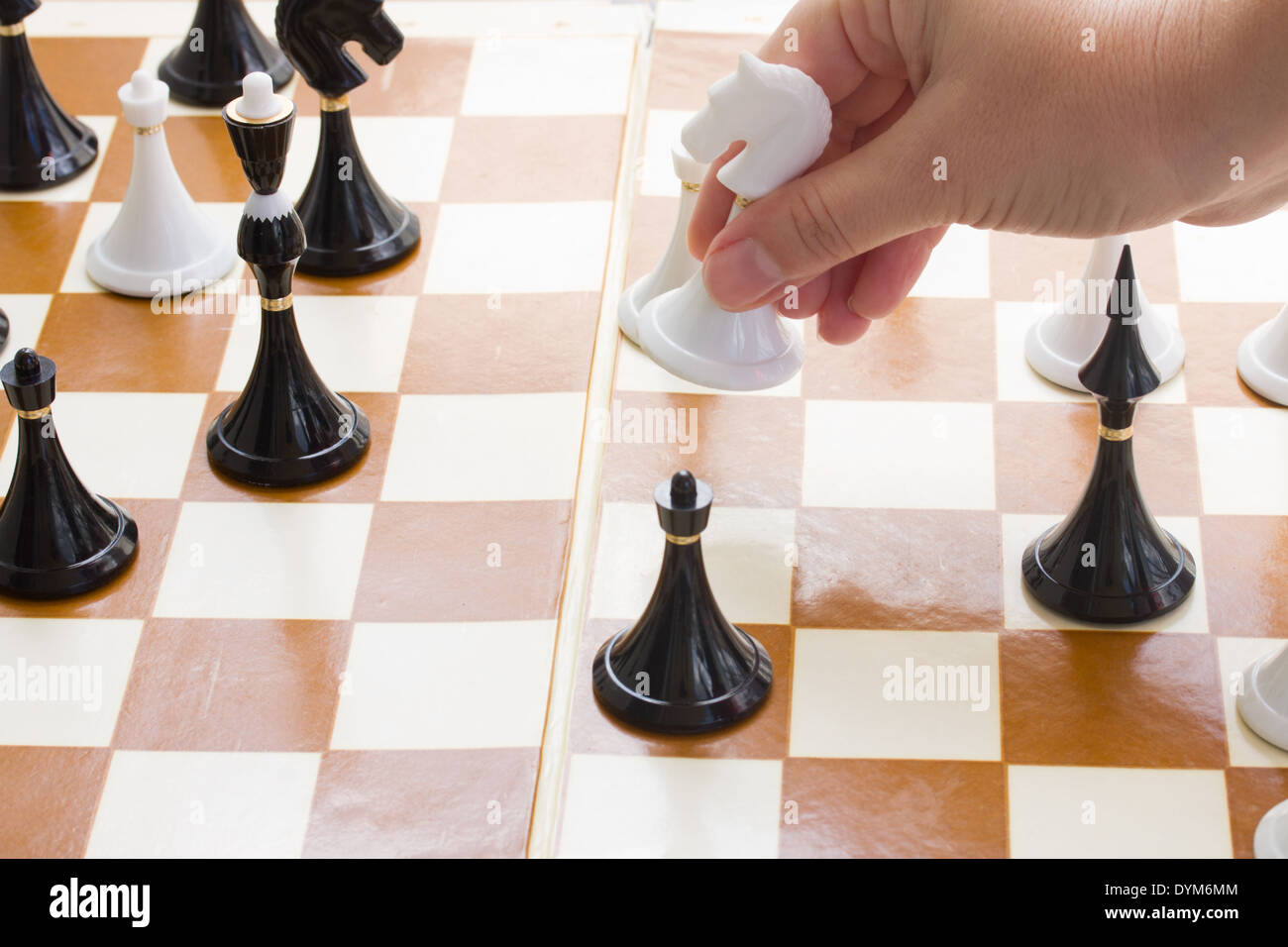 checkmate white defeats black king Stock Photo - Alamy