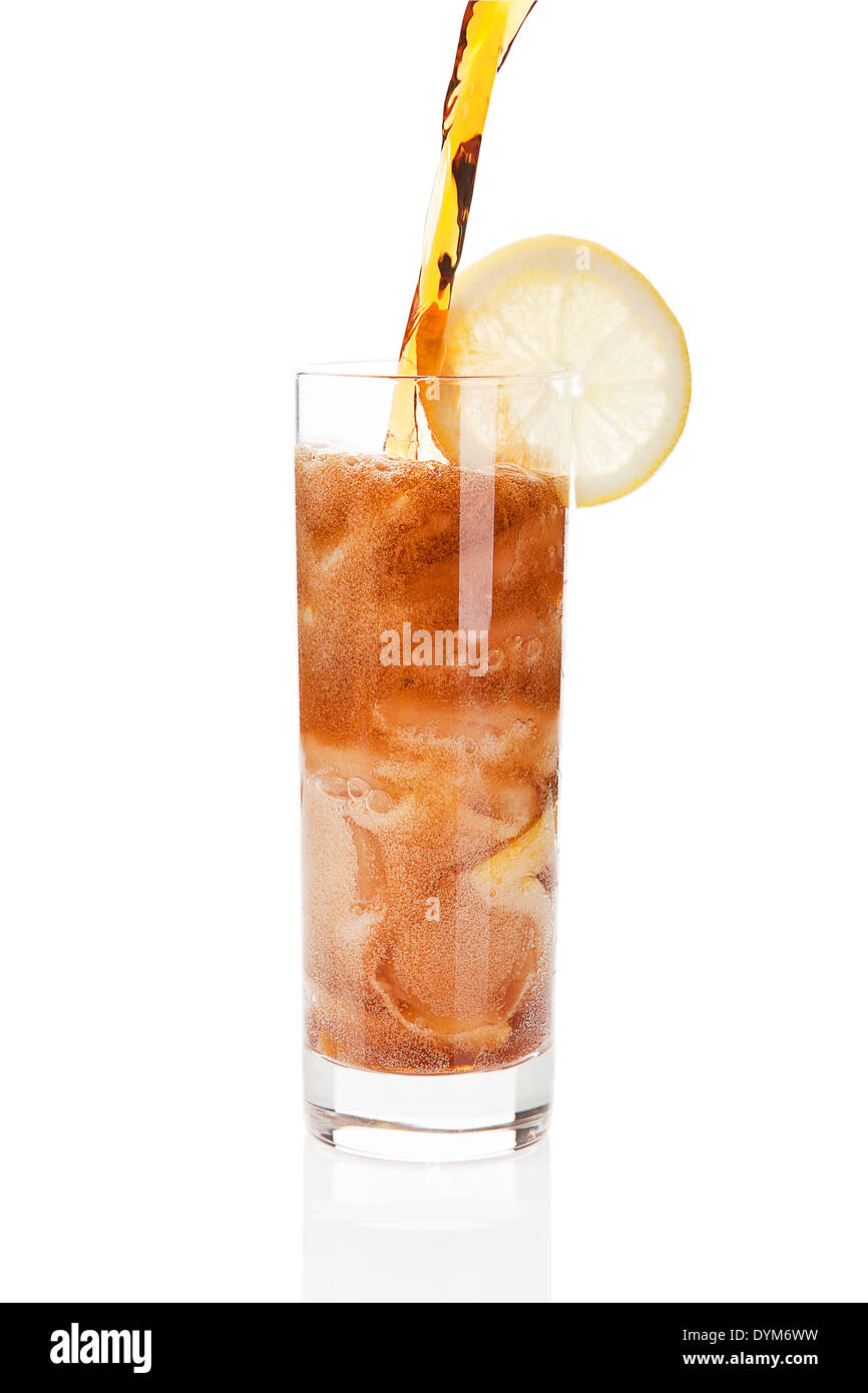 Pouring coke into a glass isolated on white background with clipping ...