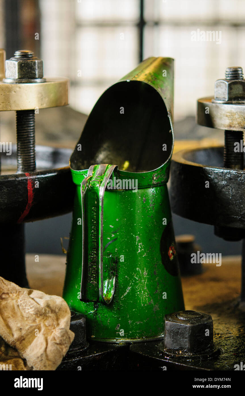 Green oil can Stock Photo - Alamy