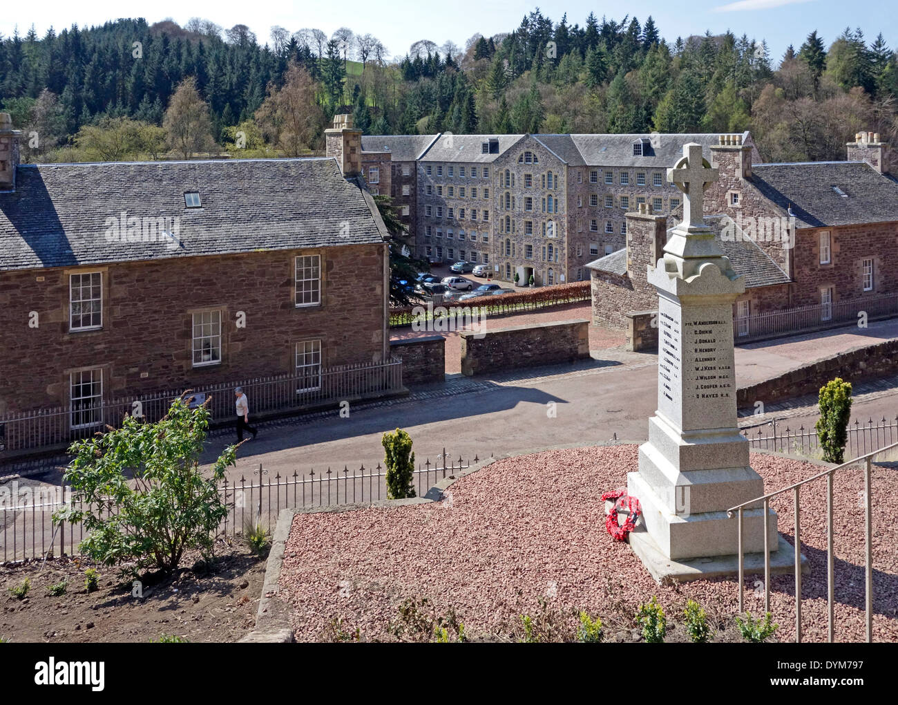 View of New Lanark Heritage Site with war memorial and New Lanark Mill ...