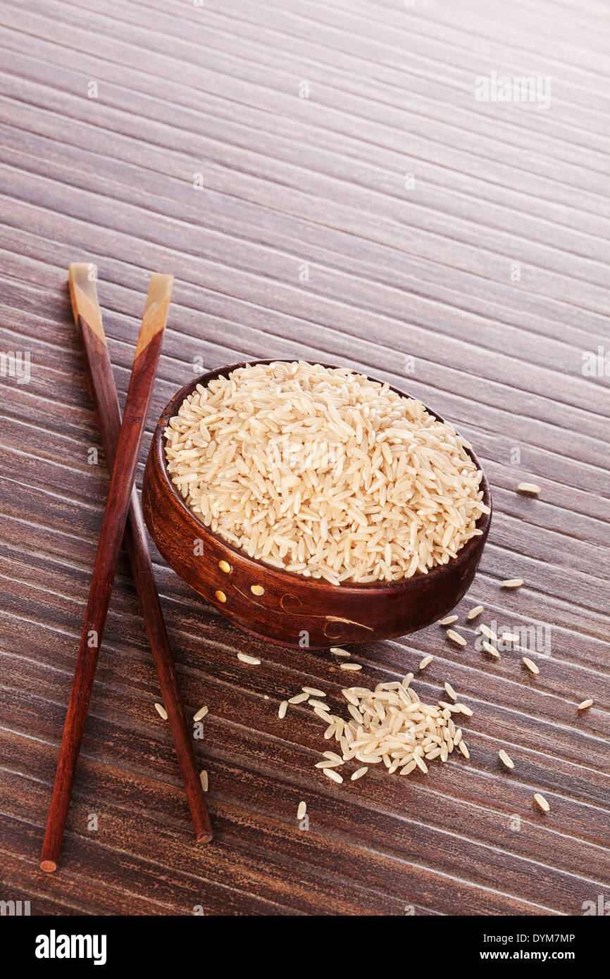 Luxurious minimal natural brown rice background. Raw rice crop in brown ...
