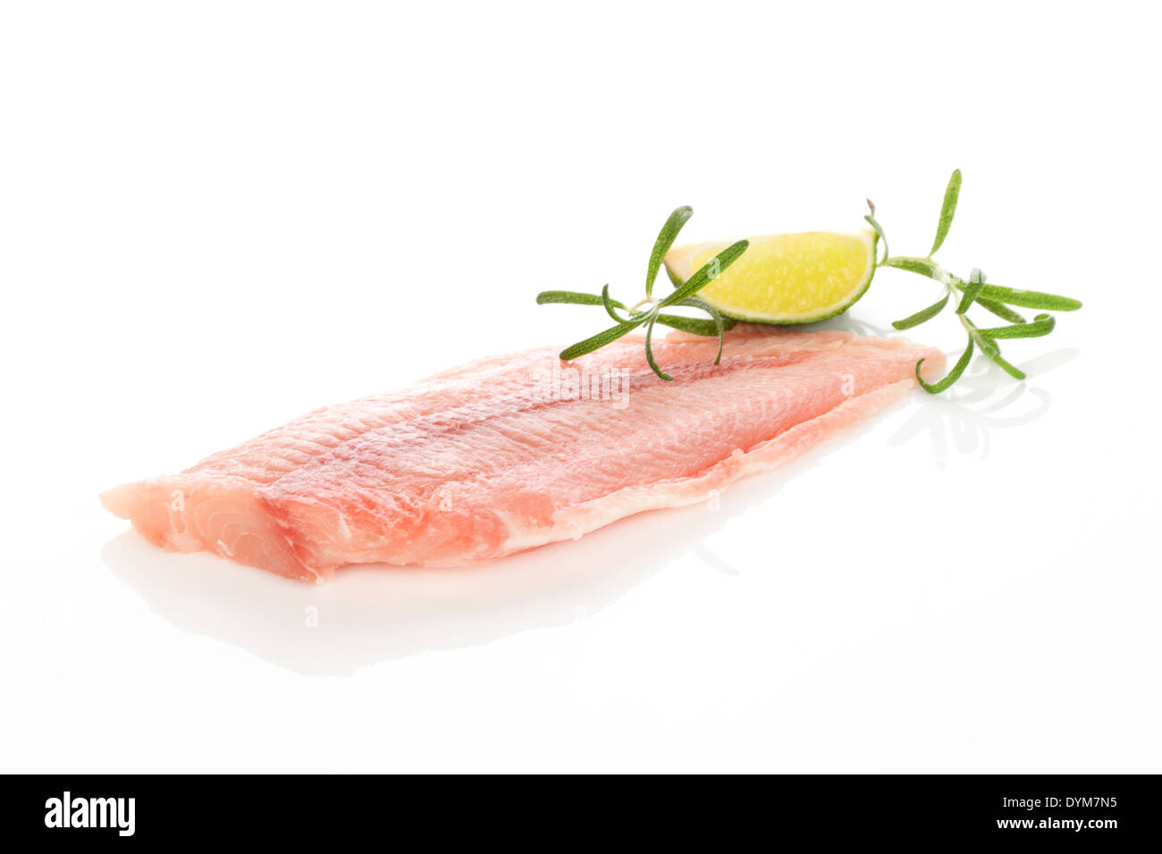 Delicious fish fillet with lime and rosemary isolated on white ...