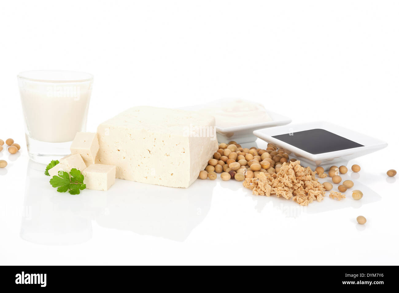 Tofu, soymilk, soybeans, soy granules, soy cream and soy sauce isolated ...