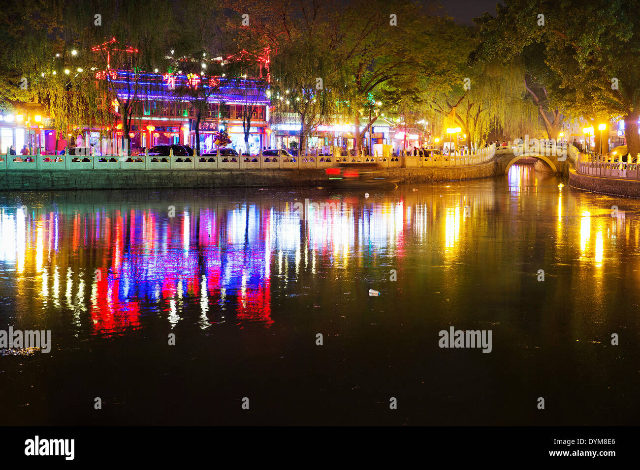 Thousands of locals and visitors of Beijing enjoy night life at Chou ...