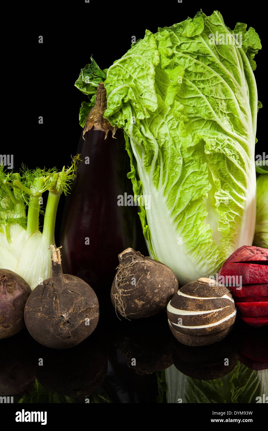 Colorful vivid fresh vegetable still life. Chinese cabbage, black ...