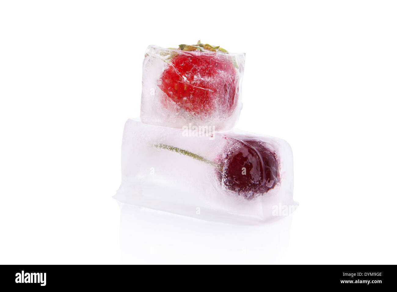 Berry fruit frozen in ice cubes isolated on white background with ...