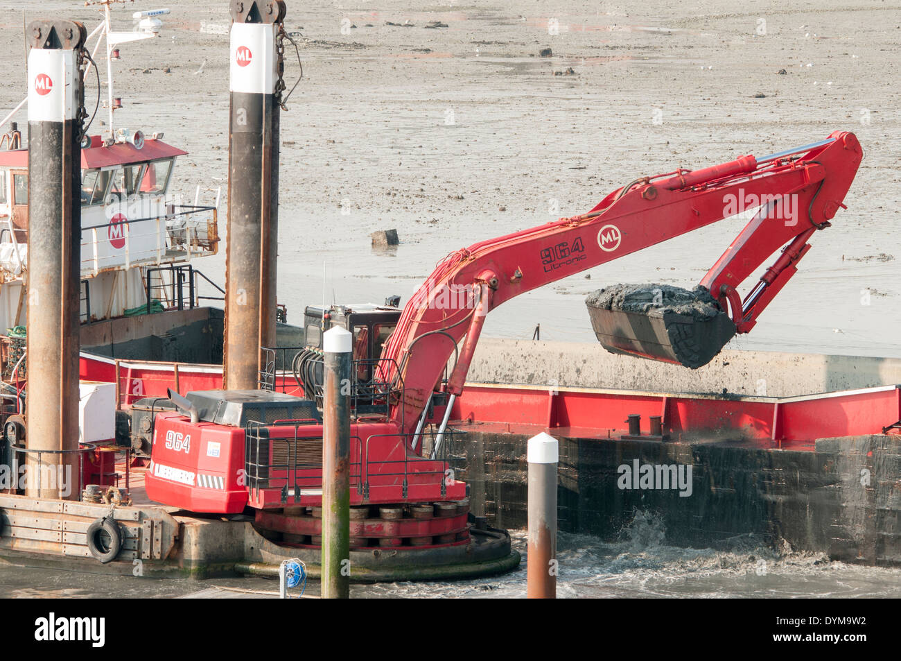 digger dredging a channel Stock Photo - Alamy