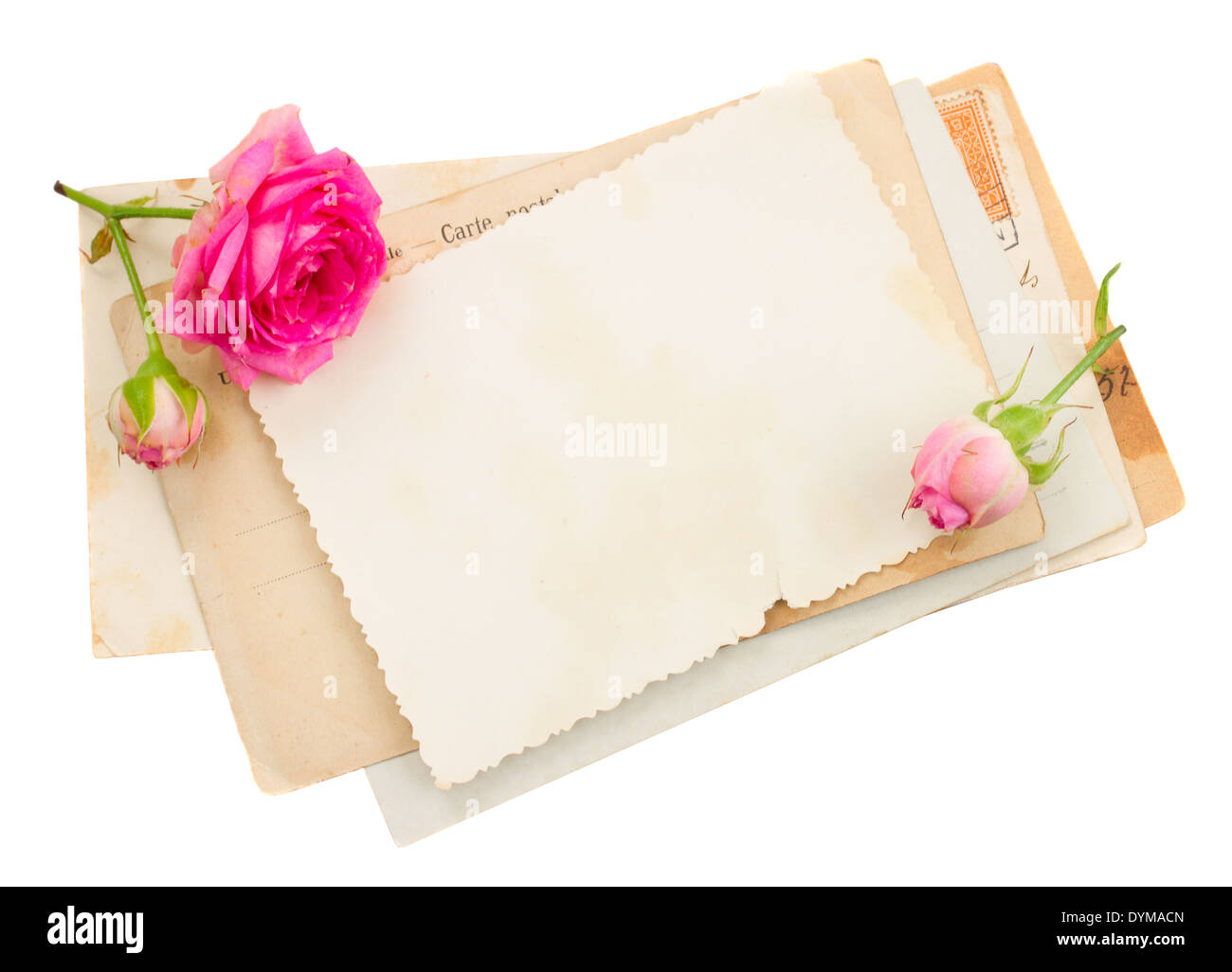 bunch of old papers with roses Stock Photo - Alamy