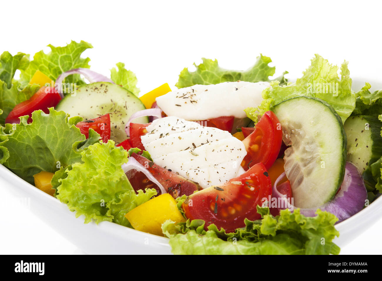 Delicious fresh colorful salad isolated on white background. Healthy ...