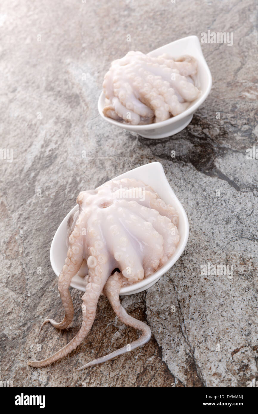 Raw octopus on natural background. Culinary sefood eating Stock Photo ...