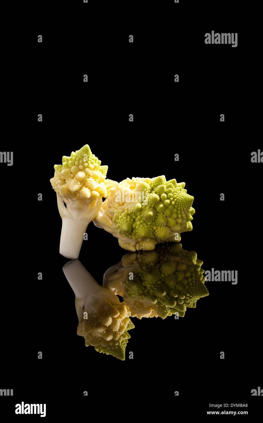 Romanesque cauliflower pieces isolated on black background. Healthy raw ...