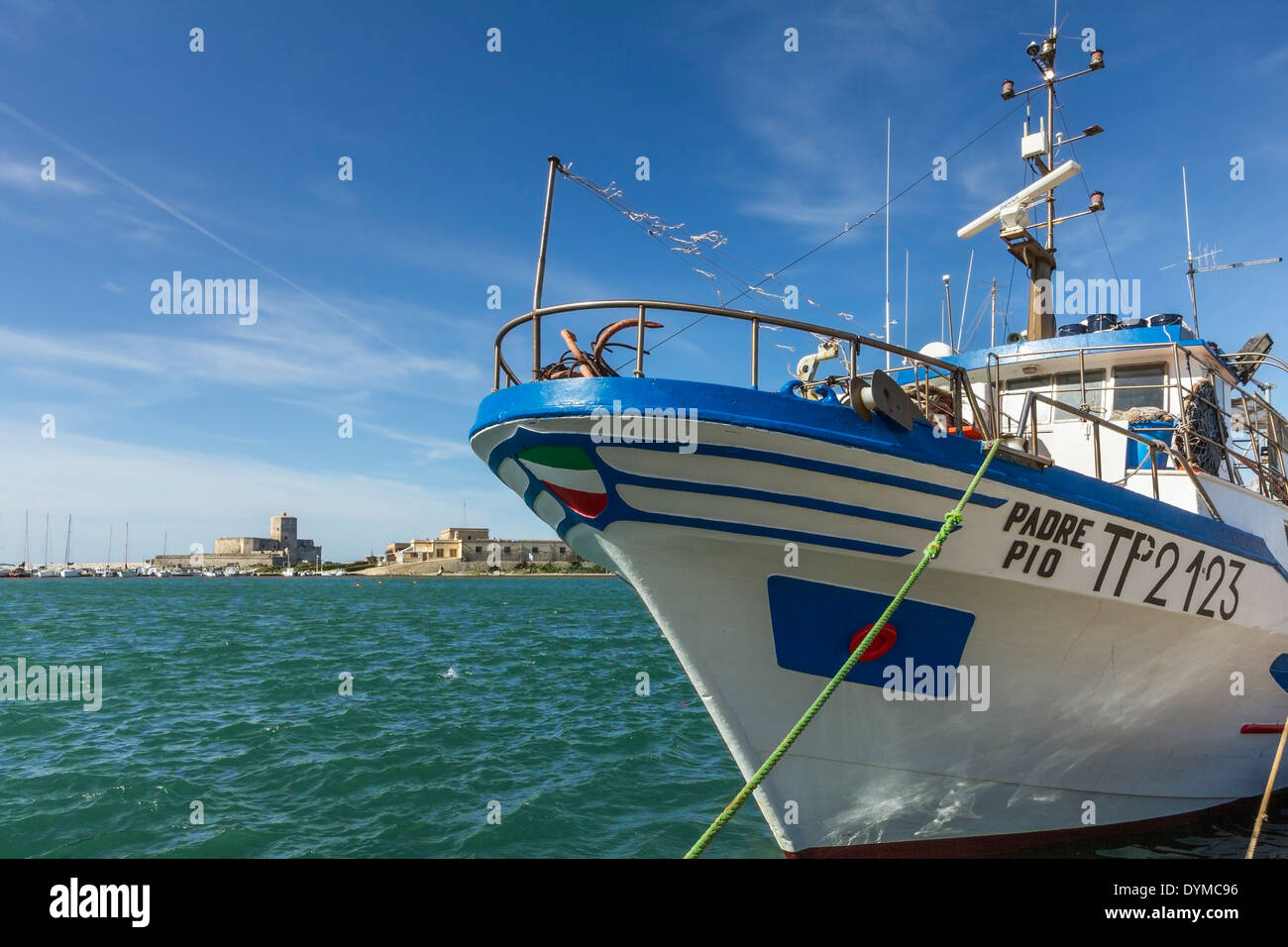 Fishing trawler & Castello Colombaia at the harbour of this major ...