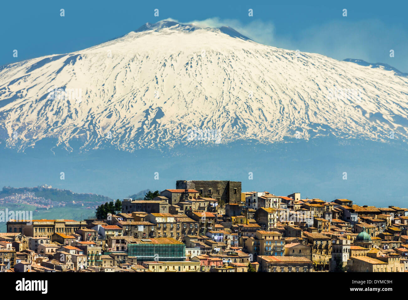 Hill town with backdrop of snowy volcano Mount Etna; Gangi was a common ...