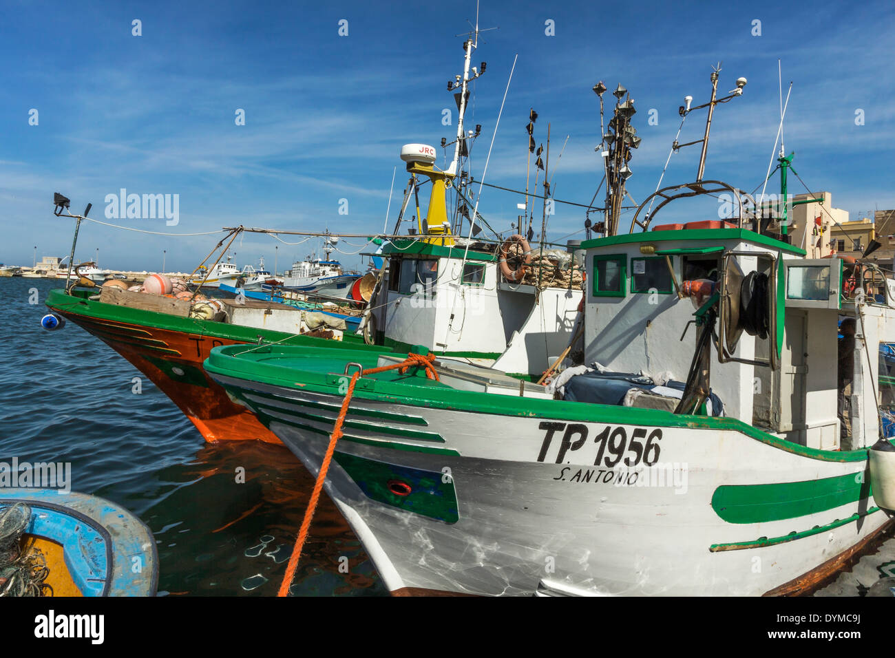 Fishing trawlers in the bustling harbour district of this major north ...