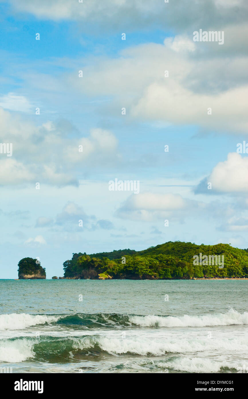 View west along the south coast from this popular small resort; Batu ...