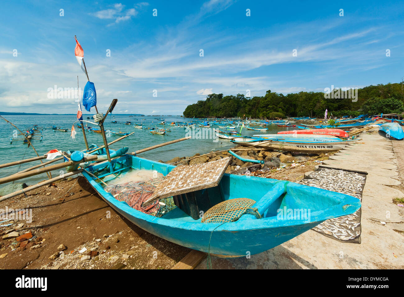 Outrigger fishing boats on the east side of the isthmus at this south ...