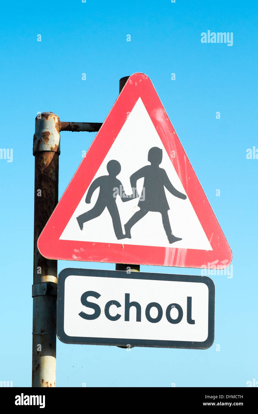 School warning sign against blue sky Stock Photo - Alamy