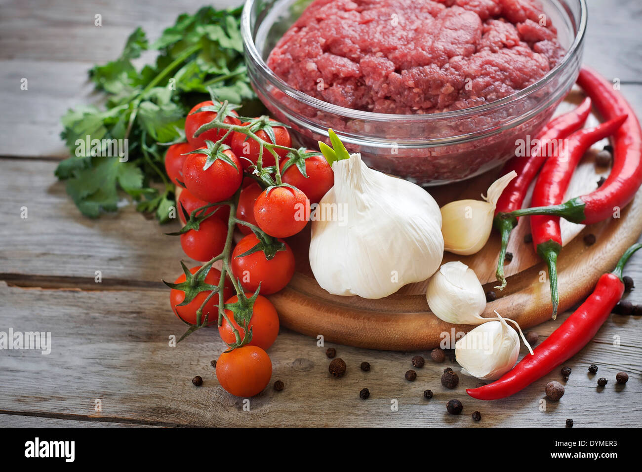 Minced meat, chili pepper, cherry tomato, cilantro and garlic ...